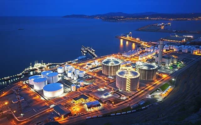 industrial factory at night - Rohrer Group